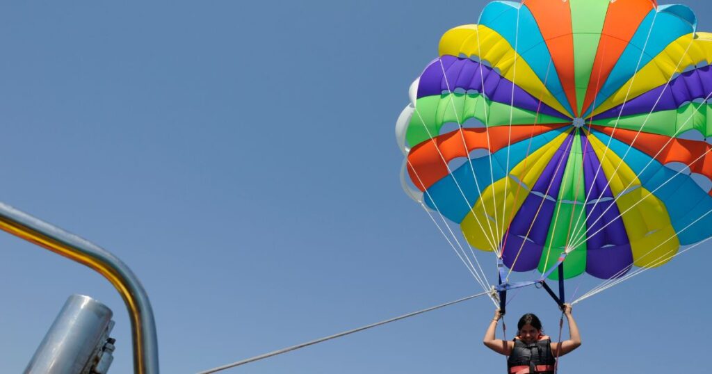 Parasailing in Khanpur Dam becoming popular. - Khanpur Dam